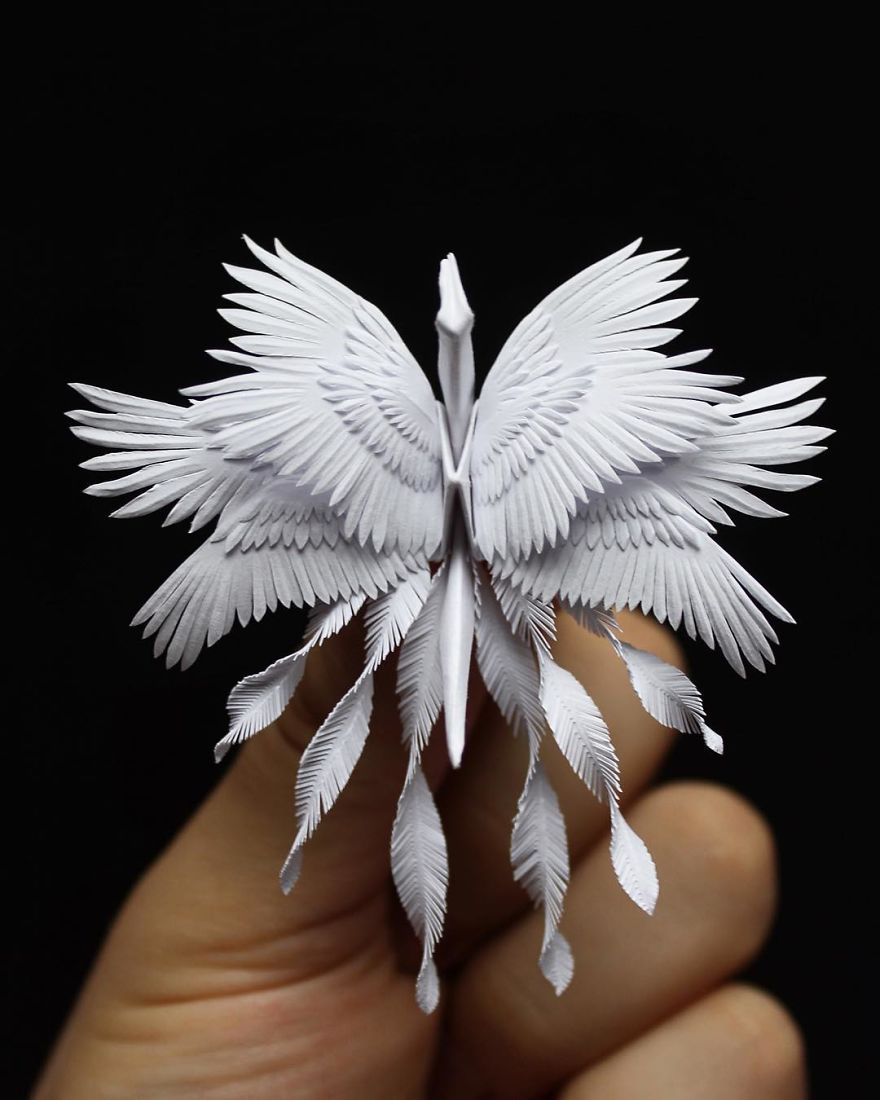 Folded and decorated origami crane project by Cristian Marianciuc - Ego ...