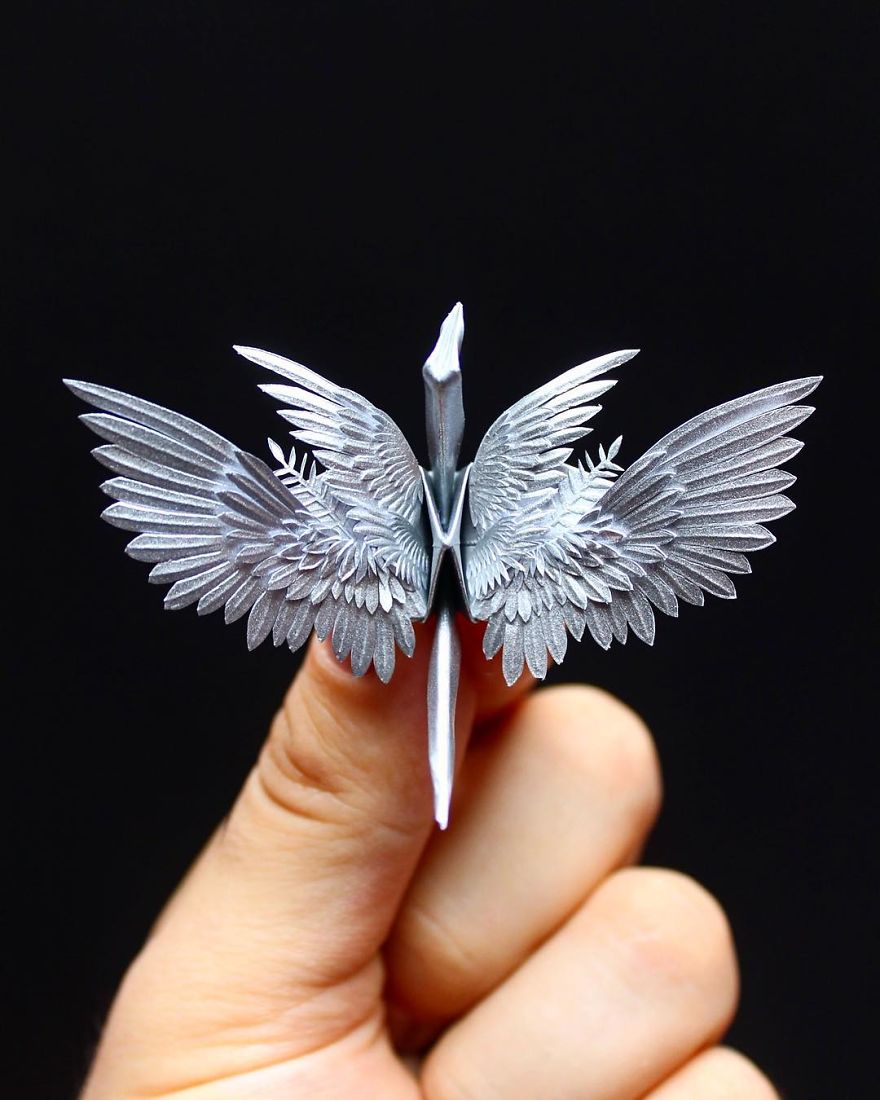 Folded and decorated origami crane project by Cristian Marianciuc - Ego ...