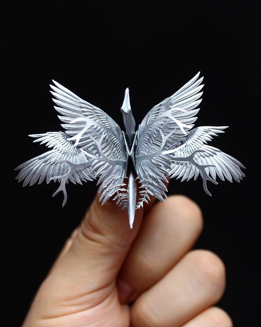 Folded and decorated origami crane project by Cristian Marianciuc - Ego ...