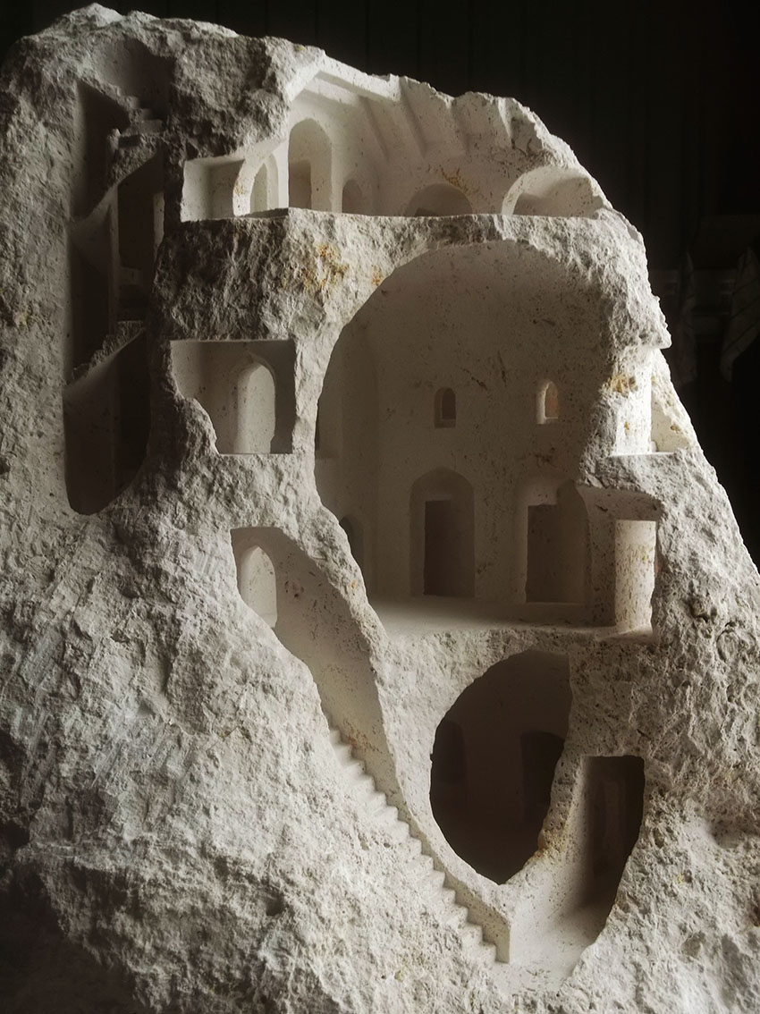 Miniature architectural structures carved into raw stone by Matthew ...